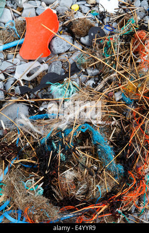 flotsam on the beach, a mixture of plastic and old rope and debris ...