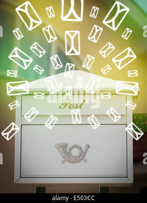 Mailbox with letter icons on glowing green background Stock Photo - Alamy