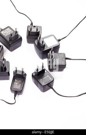 A cell phone chargers on white background Stock Photo - Alamy