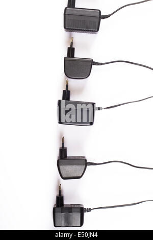 A cell phone chargers on white background Stock Photo - Alamy