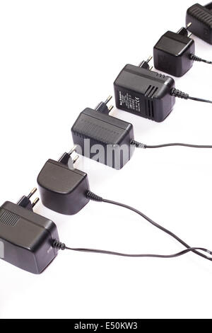 A cell phone chargers on white background Stock Photo - Alamy
