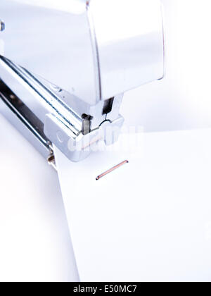 Silver Stapler´s picture over white background Stock Photo - Alamy