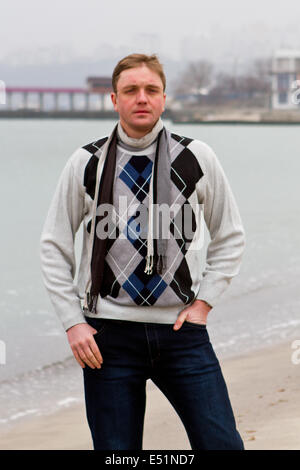 Handsome businessman on light background Stock Photo - Alamy