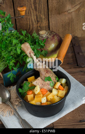 Goose - soup with red wine and thyme Stock Photo - Alamy