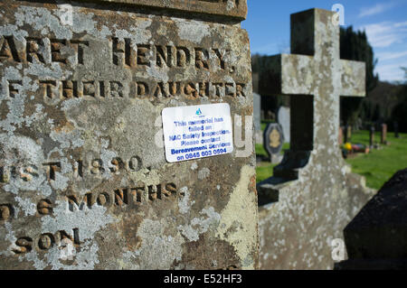 Memorial safety inspection notice on gravestones in a graveyard Stock ...