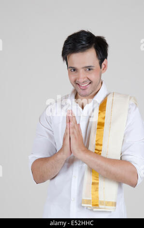 Portrait of South Indian man greeting Stock Photo - Alamy