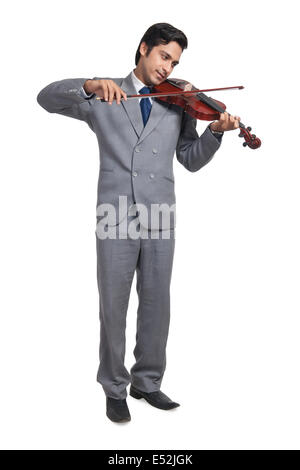 young businessman playing violin Stock Photo - Alamy