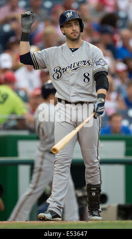 Milwaukee Brewers' Ryan Braun, right, high-fives third base coach Ed ...