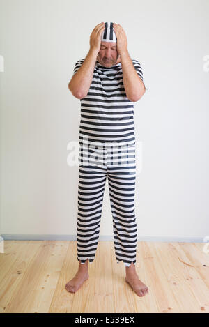portrait of a man prisoner in prison garb Stock Photo - Alamy