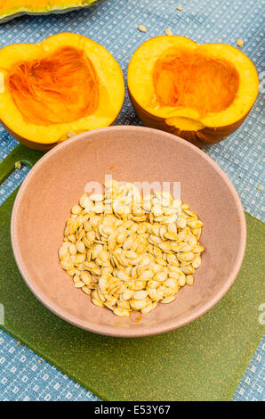 Pumpkins cut open to extract the seeds Stock Photo - Alamy