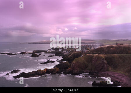 St Abbs coastal village viewed from the clifftop at White Heugh above ...