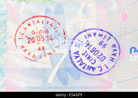 Visa entry and exit stamps in passport Stock Photo - Alamy