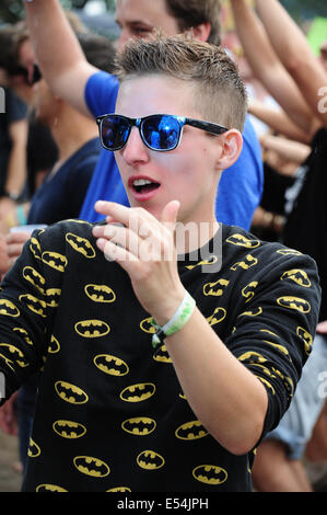 Freiburg, Germany. 20th July, 2014. Techno fans with rubber boots dance ...
