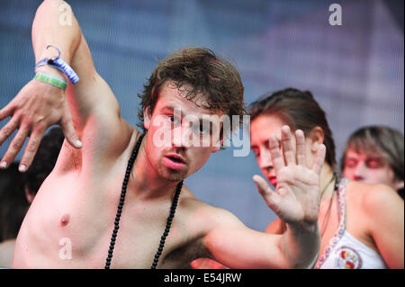 Freiburg, Germany. 20th July, 2014. Techno fans with pink rubber boots ...