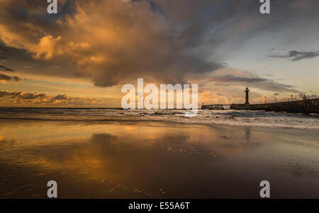 Whitby pier during sunset Stock Photo - Alamy