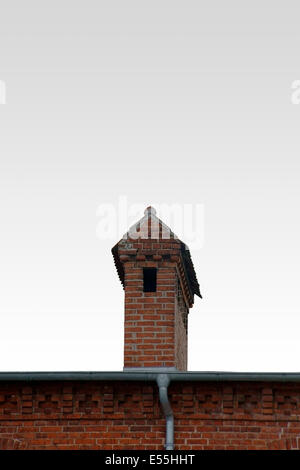 Chimney of a building with shingles roof Stock Photo - Alamy