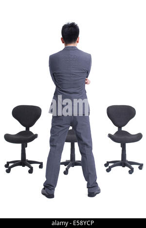 Young man selecting suitable position Stock Photo - Alamy