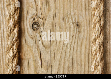 Strong Rope Frame on wooden Background Stock Photo - Alamy