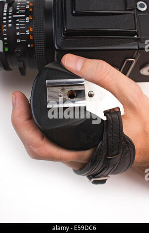 hand holds the handle of the camera isolated on white background Stock ...
