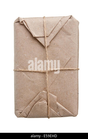 Old parcel tied with a string, isolated on white background Stock Photo ...