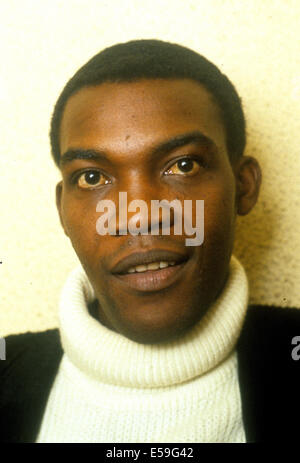DESMOND DEKKER (1941-2006) Jamaican ska and reggae musician seated ...