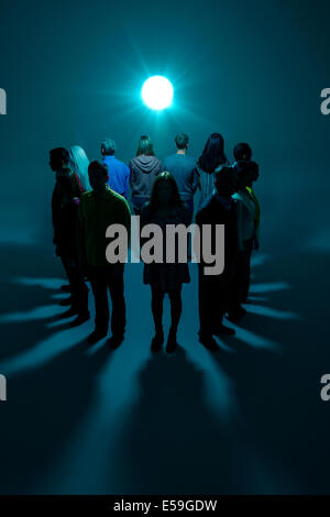 Back shot of a young man black outfit running beside the beach at ...