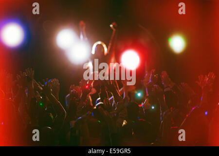 People enjoying concert Stock Photo - Alamy