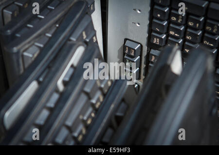 Pile of computer keyboards ready for recycling Stock Photo - Alamy