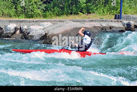 Kayaker man paddling canoe Stock Photo - Alamy