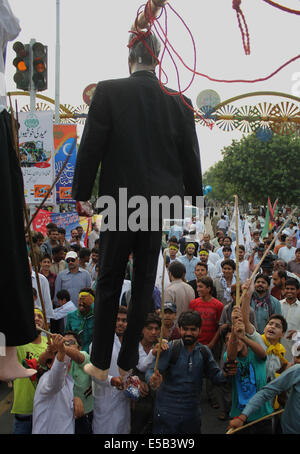Protesters burn U.S. flags during a protest near Trump International ...