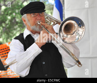 Local people playing the trumpet at local festival of Lawihan Festival ...