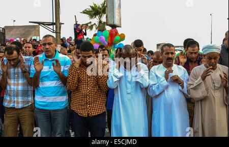 Cairo, Egypt. 28th July, 2014. Egyptians greet each other after the ...