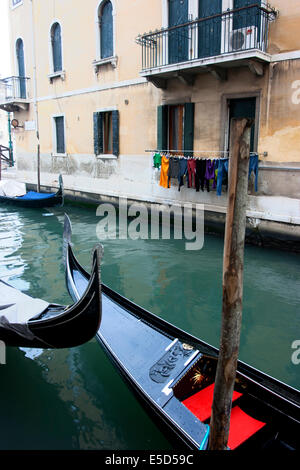 Gondolas moored on a side canal in Venice, Italy Stock Photo - Alamy