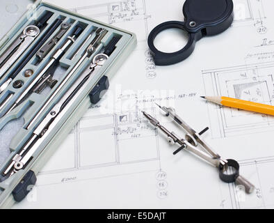 Construction drawings and magnifying glass Stock Photo - Alamy