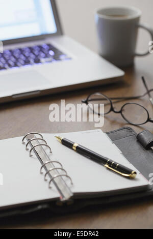 Chaotic office desk Stock Photo - Alamy