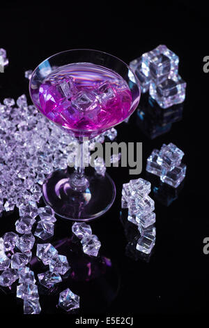 Violet coctail with ice cubes Stock Photo - Alamy