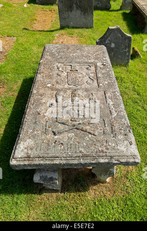 Coat of arms and cross on a gravestone, cemetery near the Jakobikirche ...