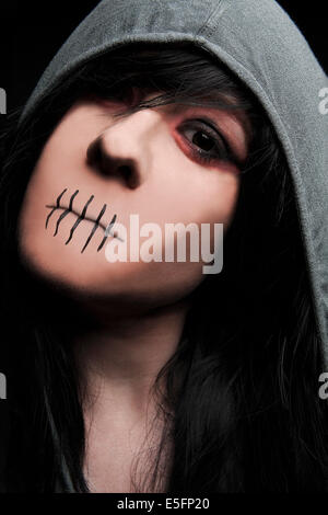Female zombie without mouth looks into the camera Stock Photo - Alamy