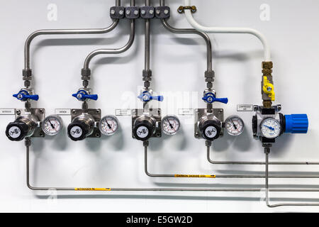 Gas supply taps valves for laboratory fume cupboard Stock Photo - Alamy
