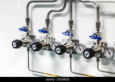Gas supply taps valves for laboratory fume cupboard Stock Photo - Alamy