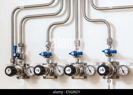 Gas supply taps valves for laboratory fume cupboard Stock Photo - Alamy