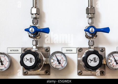 Gas supply taps valves for laboratory fume cupboard Stock Photo - Alamy
