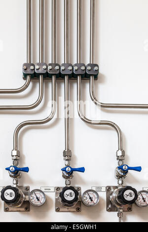 Gas supply taps valves for laboratory fume cupboard Stock Photo - Alamy