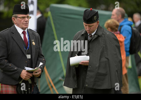 Melrose, UK. 02 Aug 2014. Melrose Pipe Band C/Ships A young piper ...