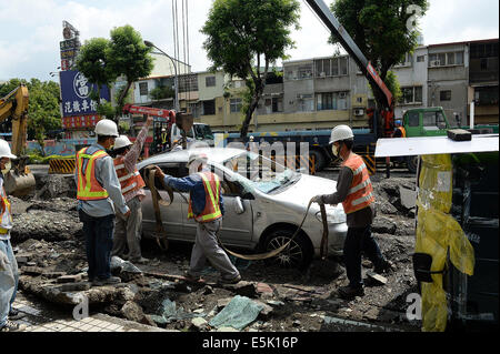 Kaohsiung, China's Taiwan. 2nd Aug, 2014. A rescuer searches at the ...