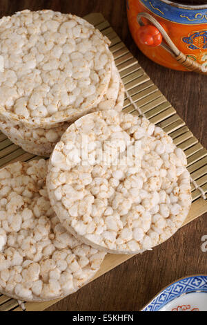 Healthy puffed rice cakes crackers stacked with sea salt close up Stock ...