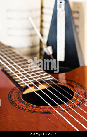 Acoustic guitar six strings. Old guitar in sunlight. Details of musical ...