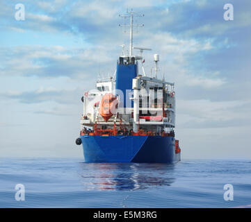 Tanker blue loaded back view in the ocean Stock Photo - Alamy