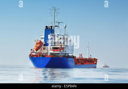 Tanker blue loaded back view in the ocean Stock Photo - Alamy