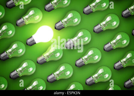 Idea concept with light bulbs. Green background Stock Photo - Alamy